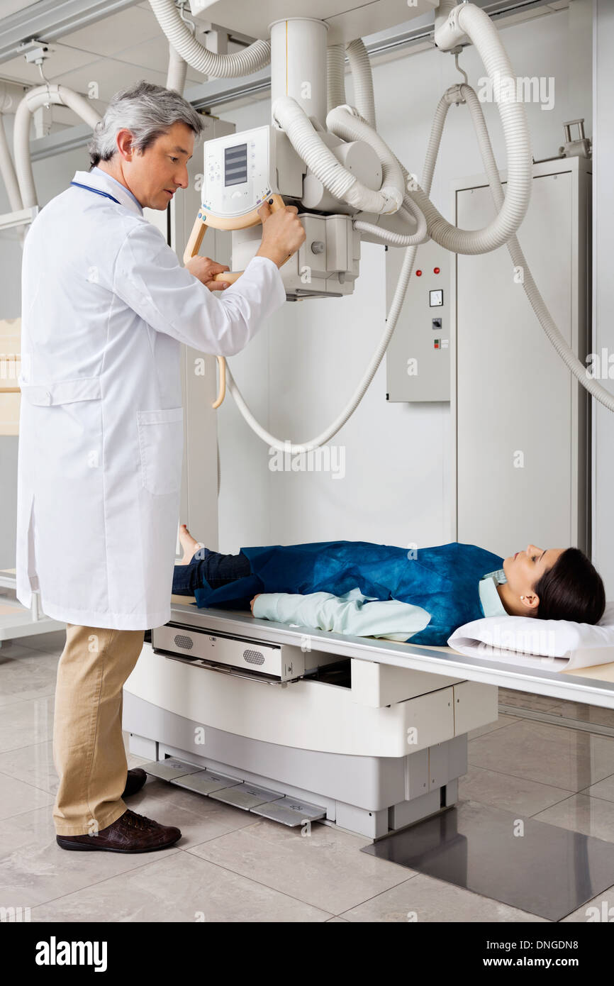 Radiologist Ready To Take X-ray Of Patient Stock Photo - Alamy