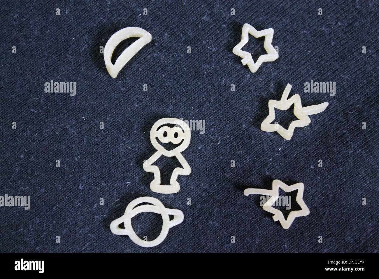 little toy man on the Saturn in fancy Universe Stock Photo - Alamy