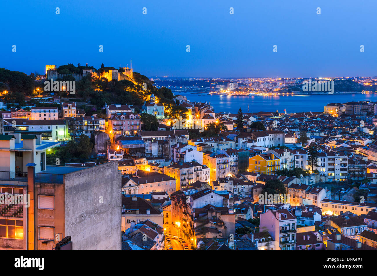 A view of the Alfama downtown at night in Lisbon, Portugal Stock Photo ...