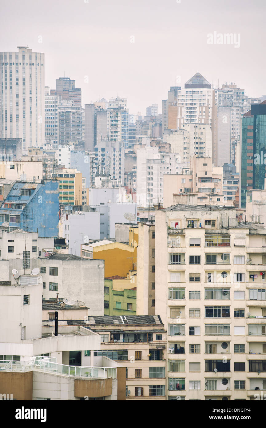 Gritty urban cityscape skyline view of Sao Paulo Brazil fades into ...