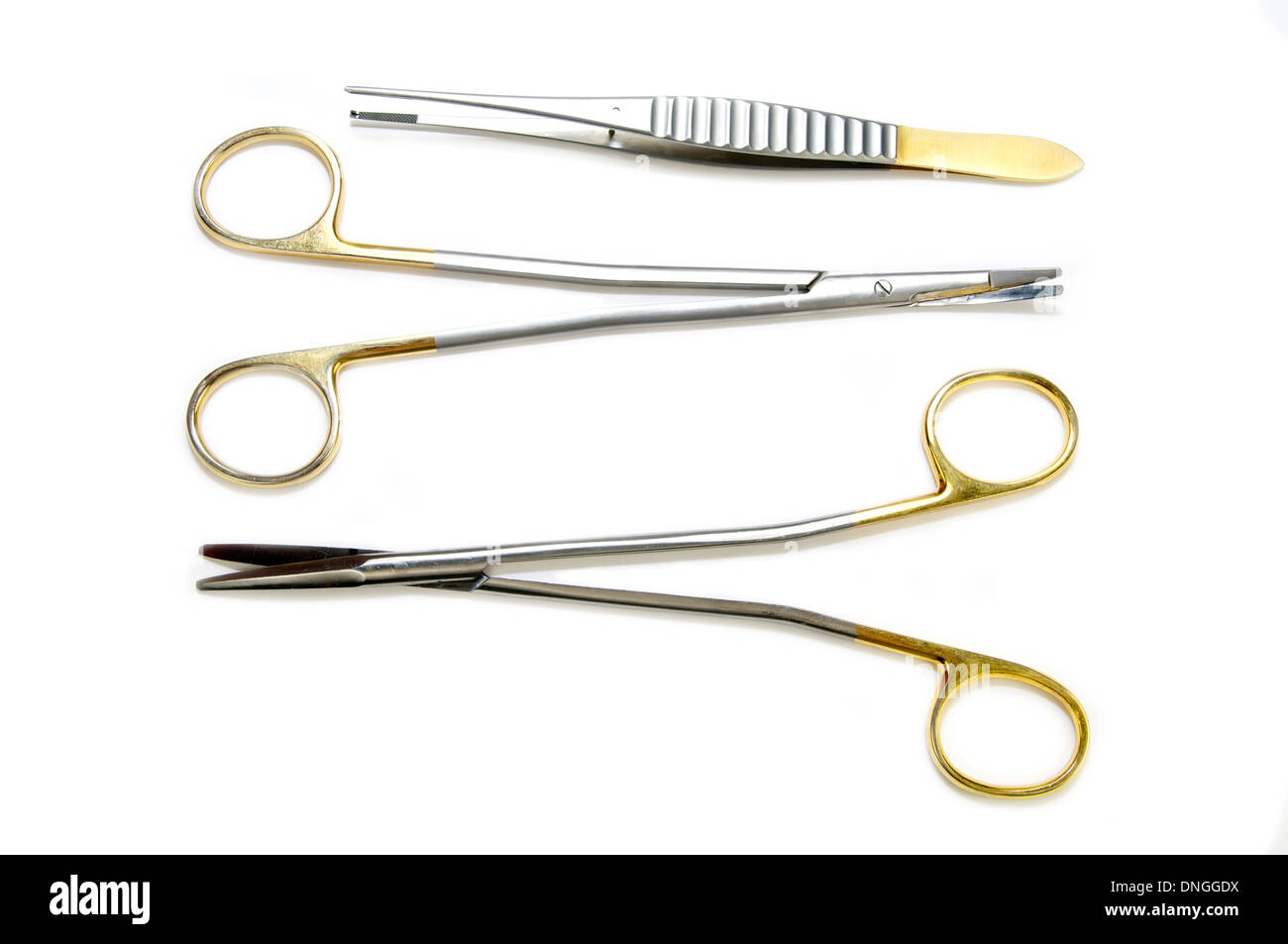 new metal surgical instruments on white background Stock Photo - Alamy
