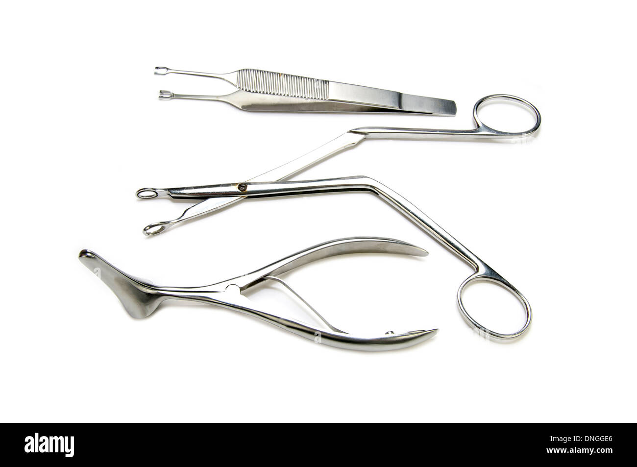 new metal surgical instruments on white background Stock Photo - Alamy