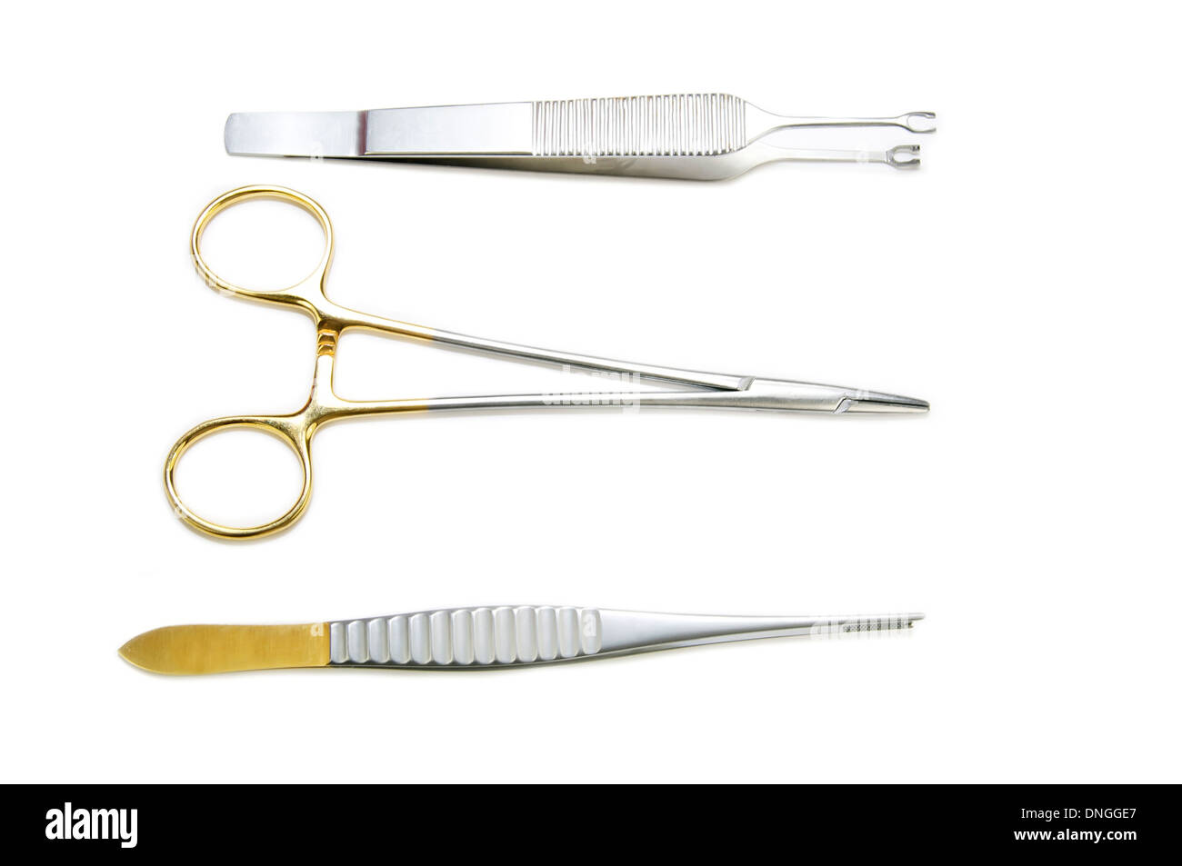 new metal surgical instruments on white background Stock Photo - Alamy