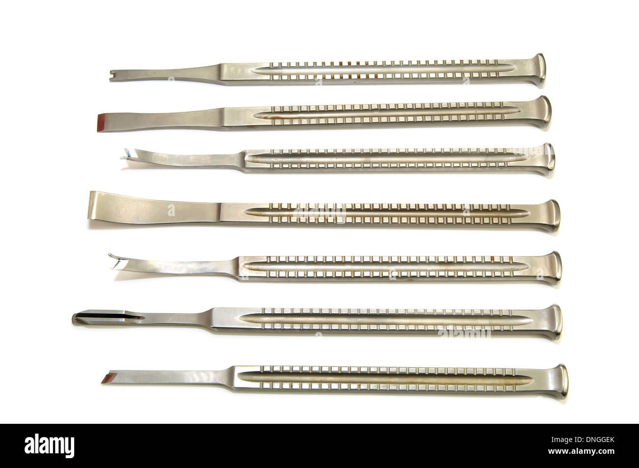new metal surgical instruments on white background Stock Photo - Alamy