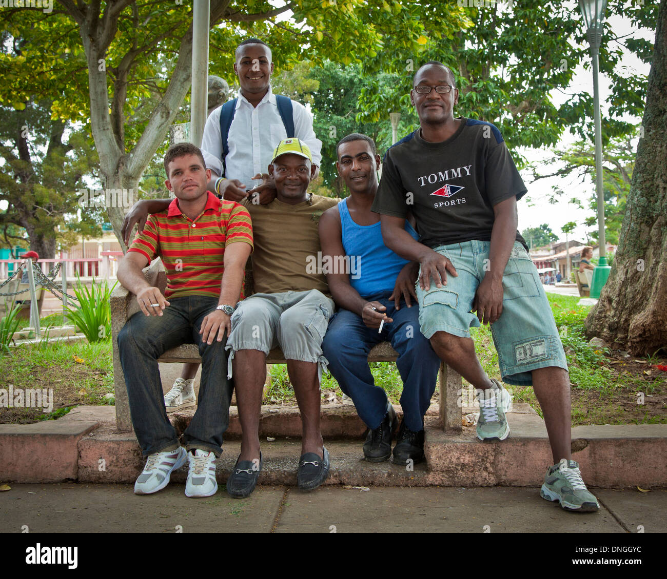 Men posing in San Cristobal in Cuba Stock Photo - Alamy