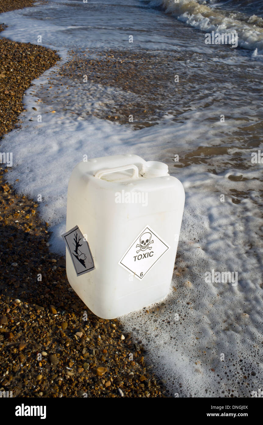 Toxic waste container washed up on a beach Stock Photo - Alamy