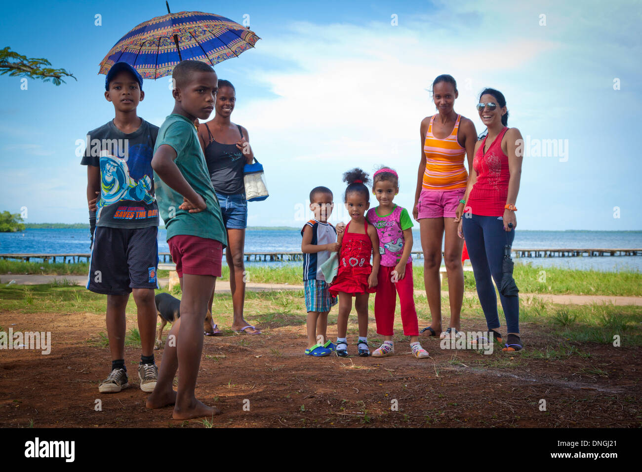 Family in Puerto Esperanza in Cuba Stock Photo - Alamy