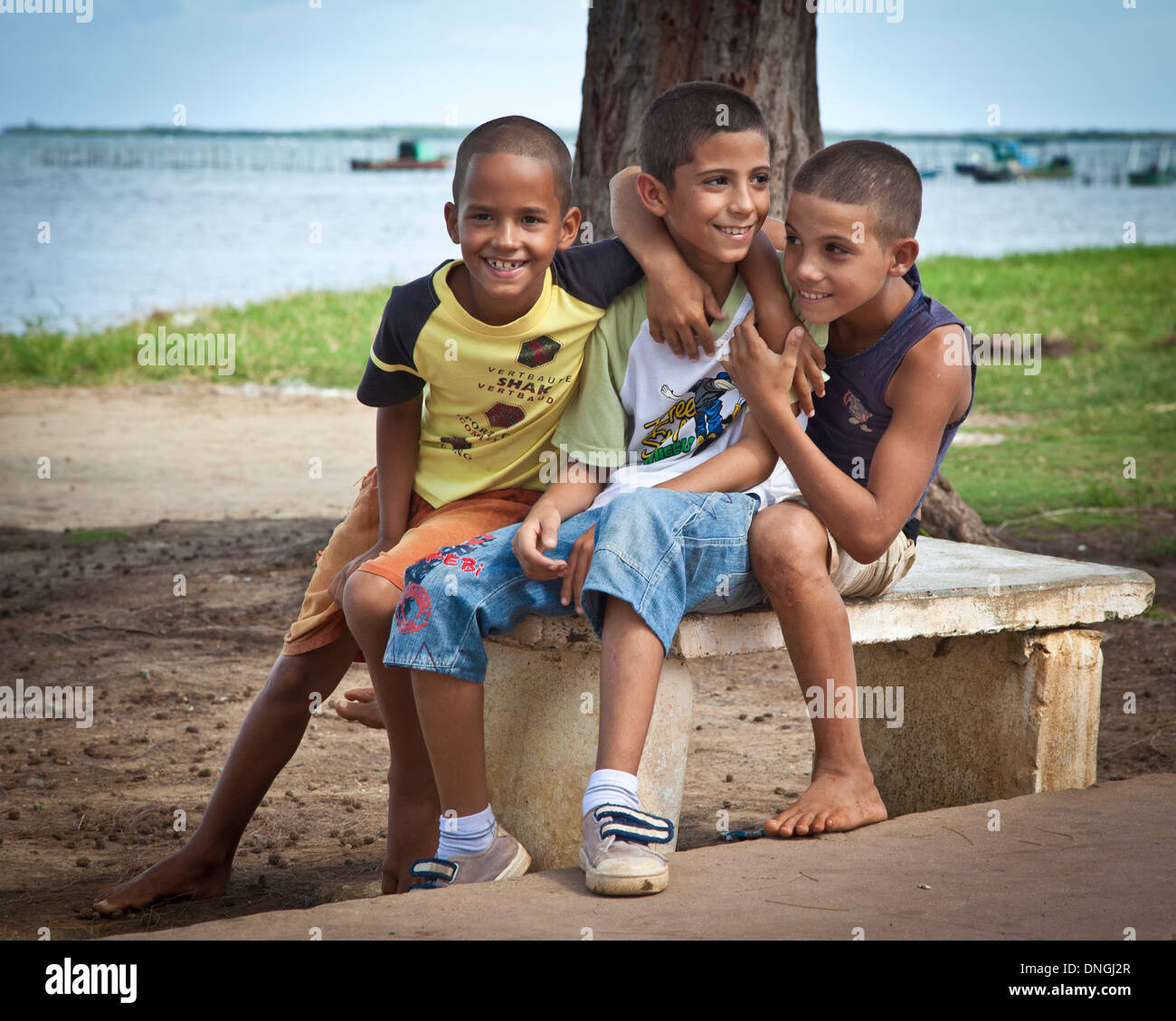 Boys laughing in Puerto Esperanza in Cuba Stock Photo - Alamy