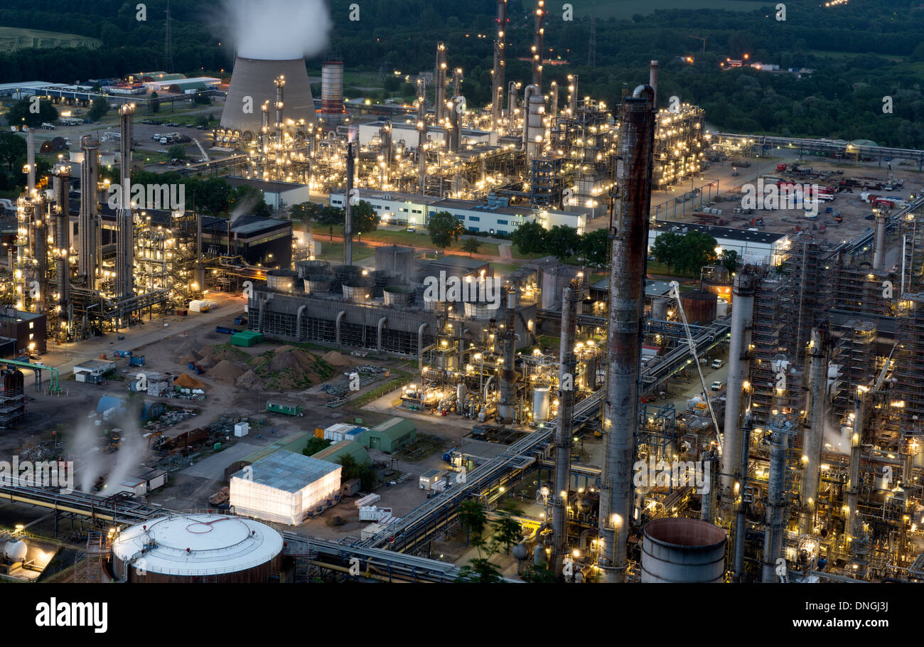 Oil refinery at night Stock Photo - Alamy