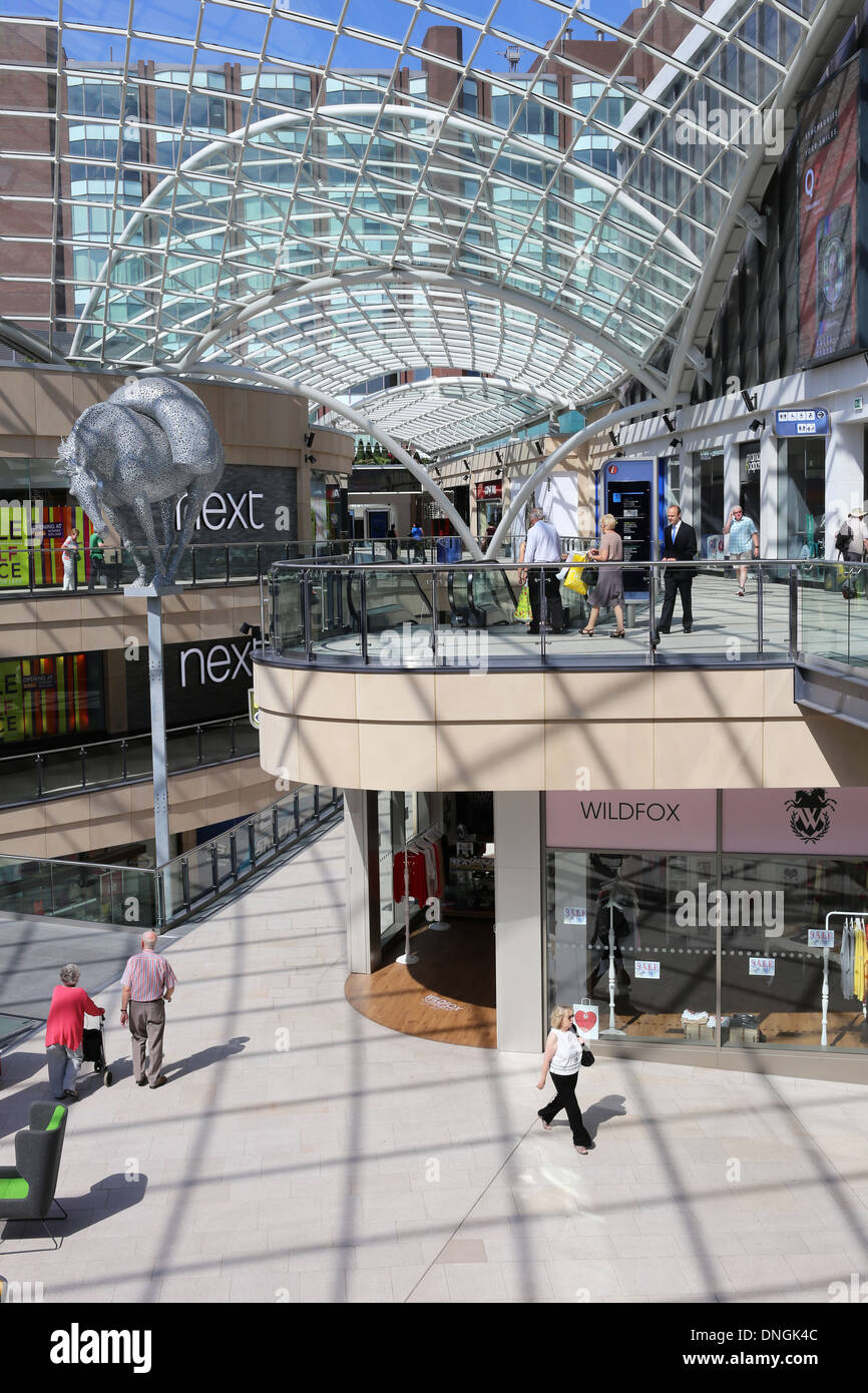 Interior of Trinity Leeds Shopping Centre showing packhorse sculpture ...