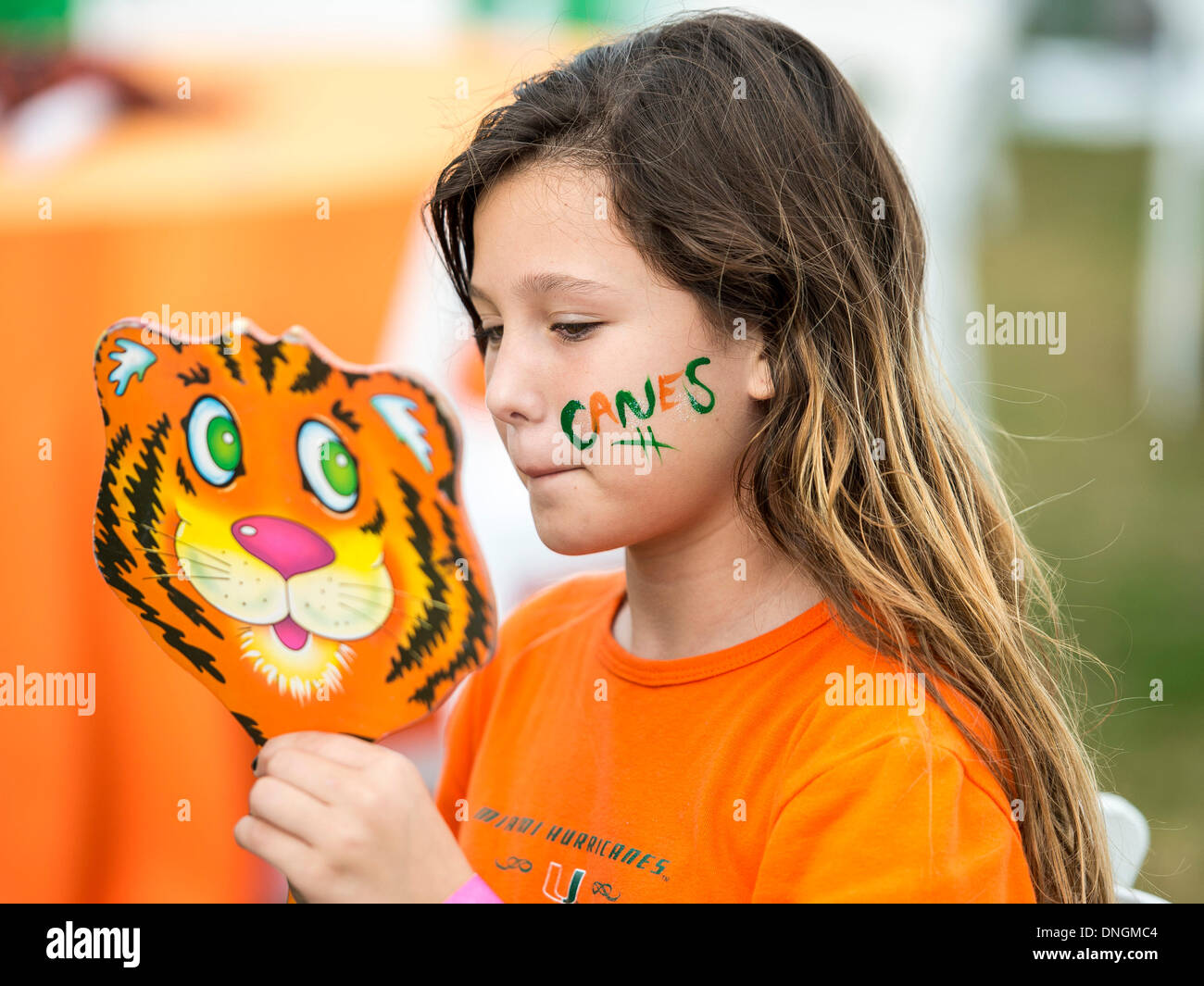 Orlando, FL, USA. 28th Dec, 2013. . S: A young Miami fan checks out the ...