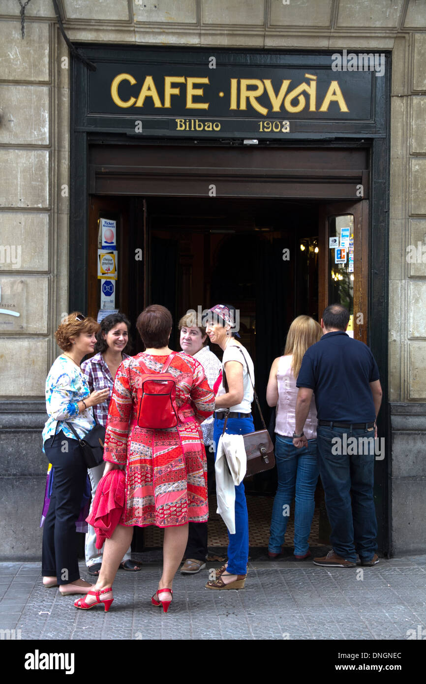 Bilbao Spain bar caffe people in street Stock Photo - Alamy