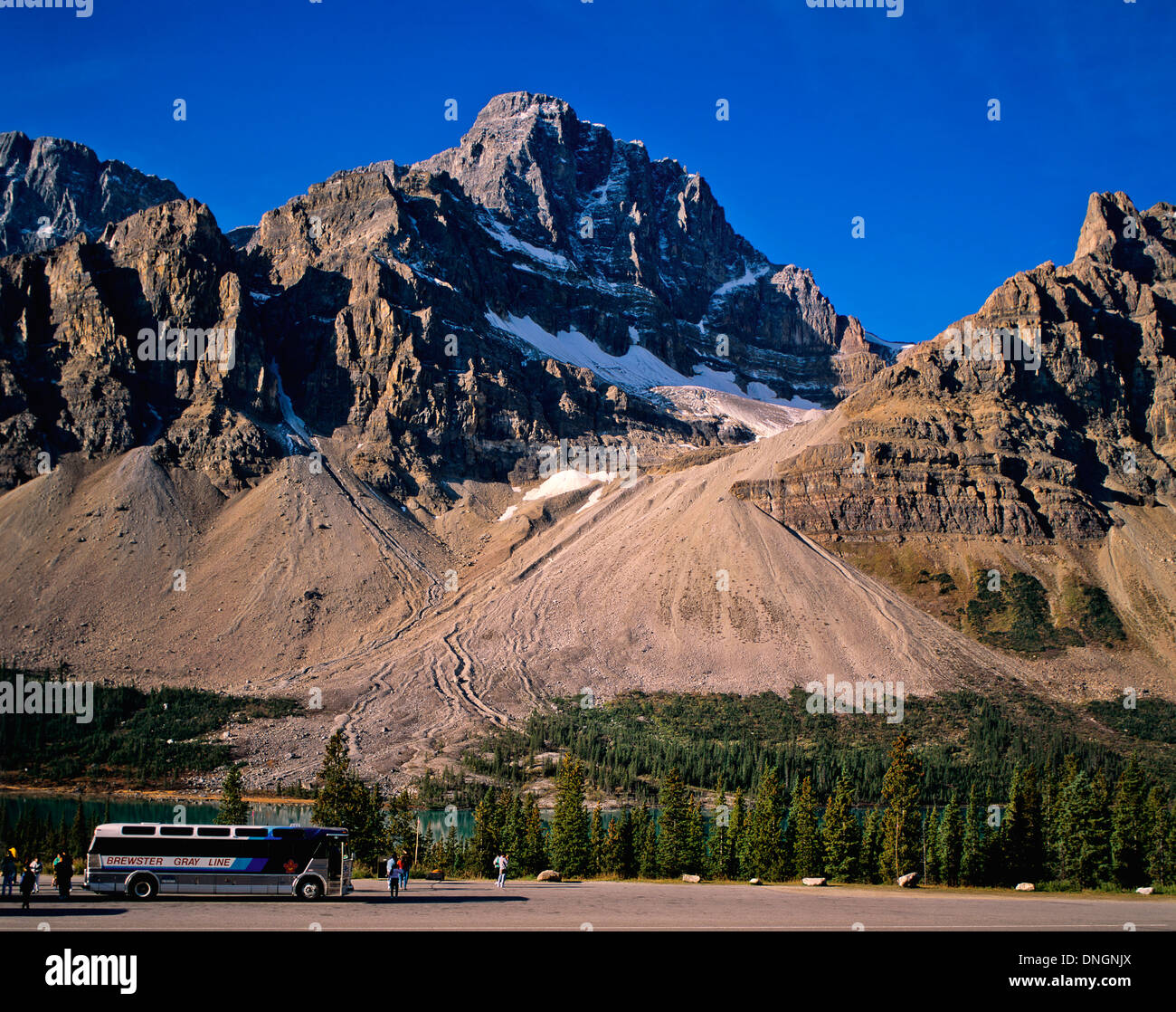 Tour bus in Banff National park showing the Canadian Rockies in ...