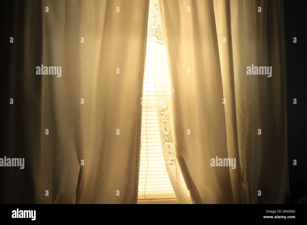Lace curtain back lit on a sunny day Stock Photo - Alamy