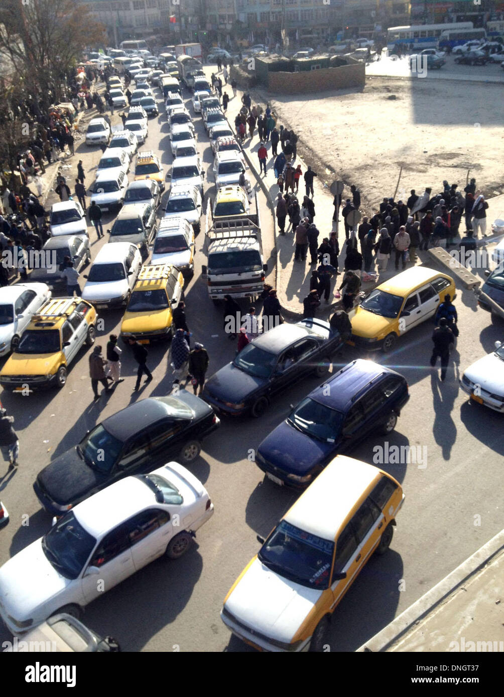 Kabul, Afghanistan. 29th Dec, 2013. Afghan commuters get stuck in a ...