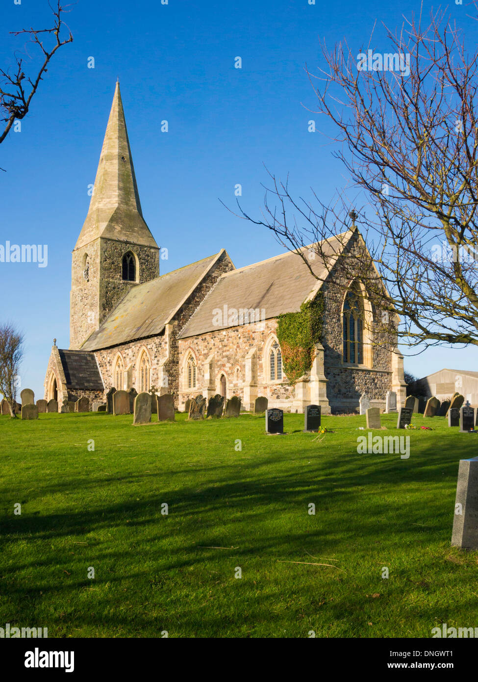 Church and graveyard of All Saints in village of Mappleton near Hornsea ...