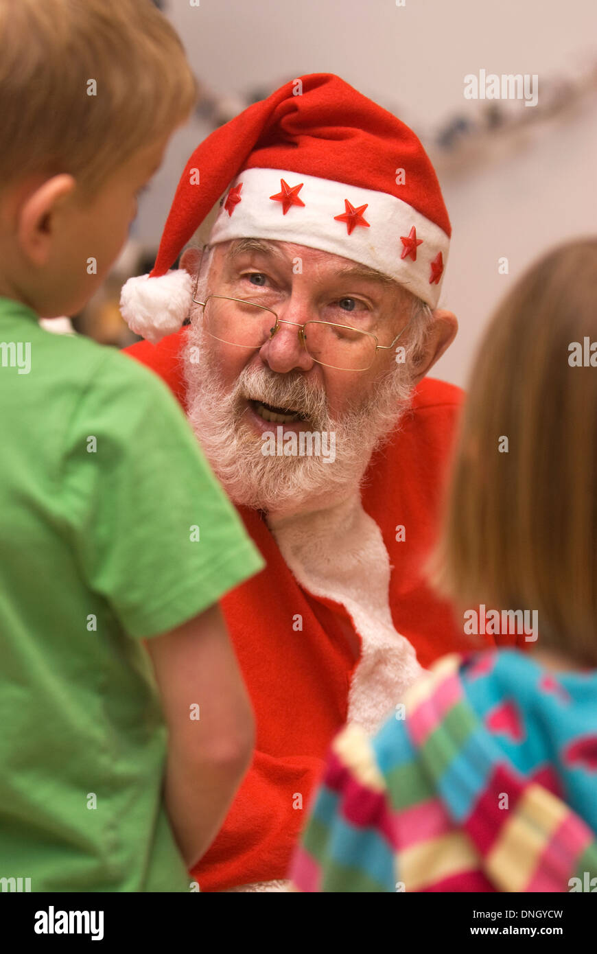 Father Christmas with children at a school xmas fayre, Steep, near ...