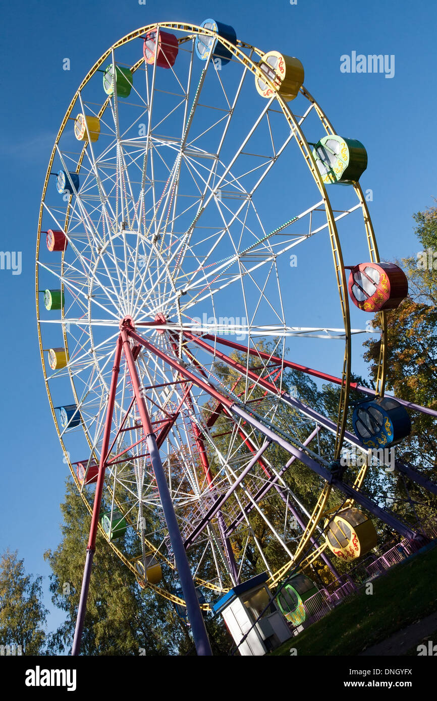 multicolored ferris wheel full size on blue sky background Stock Photo ...