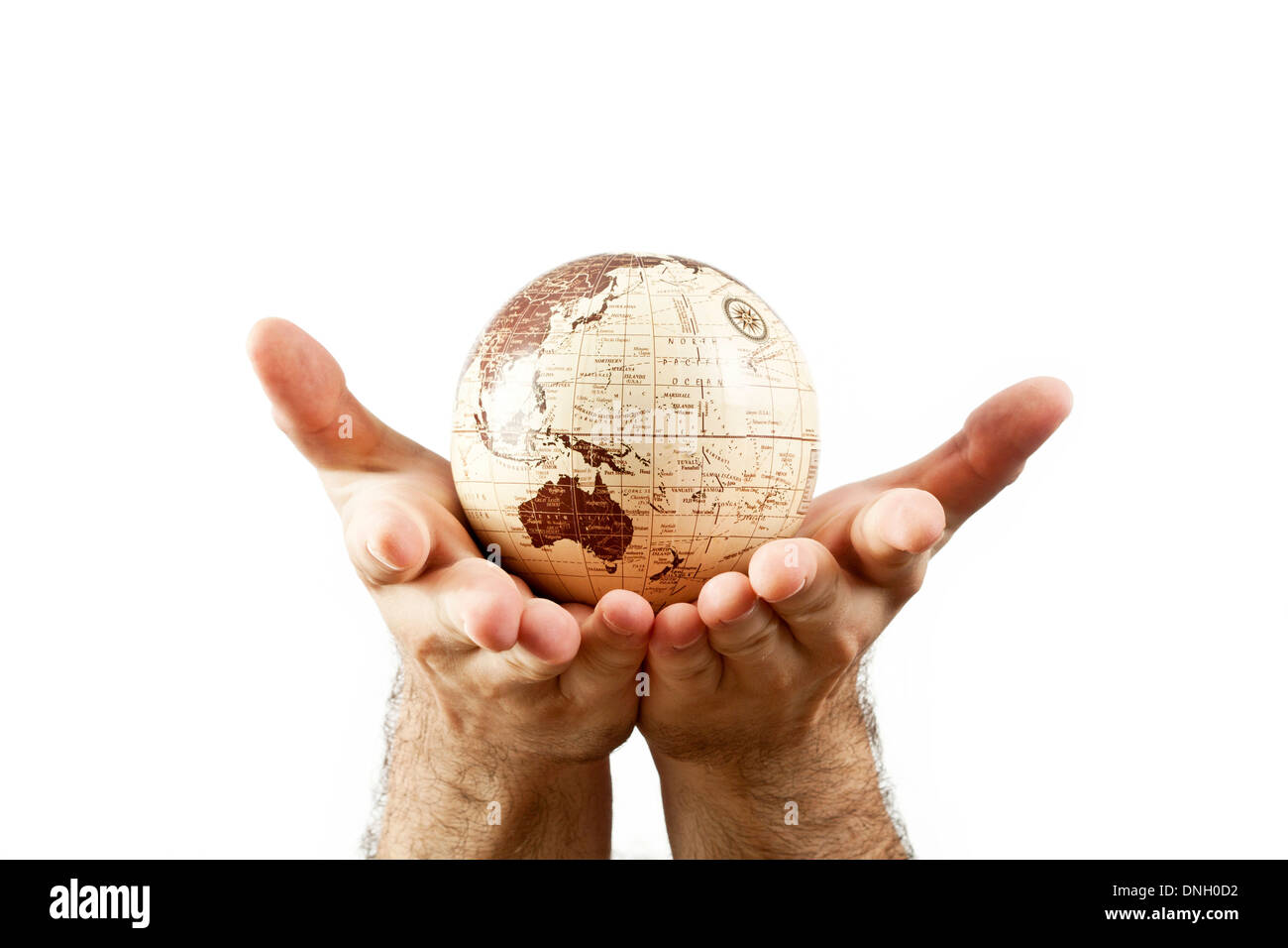 Hands holding globe Cut Out Stock Images & Pictures - Alamy