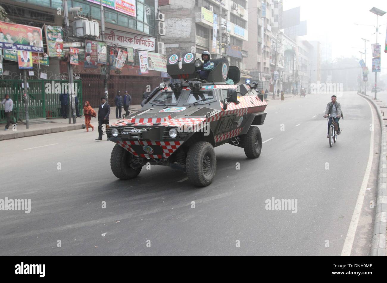 Dhaka, Bangladesh. 29th Dec, 2013. Bangladeshi police vehicle patrols ...