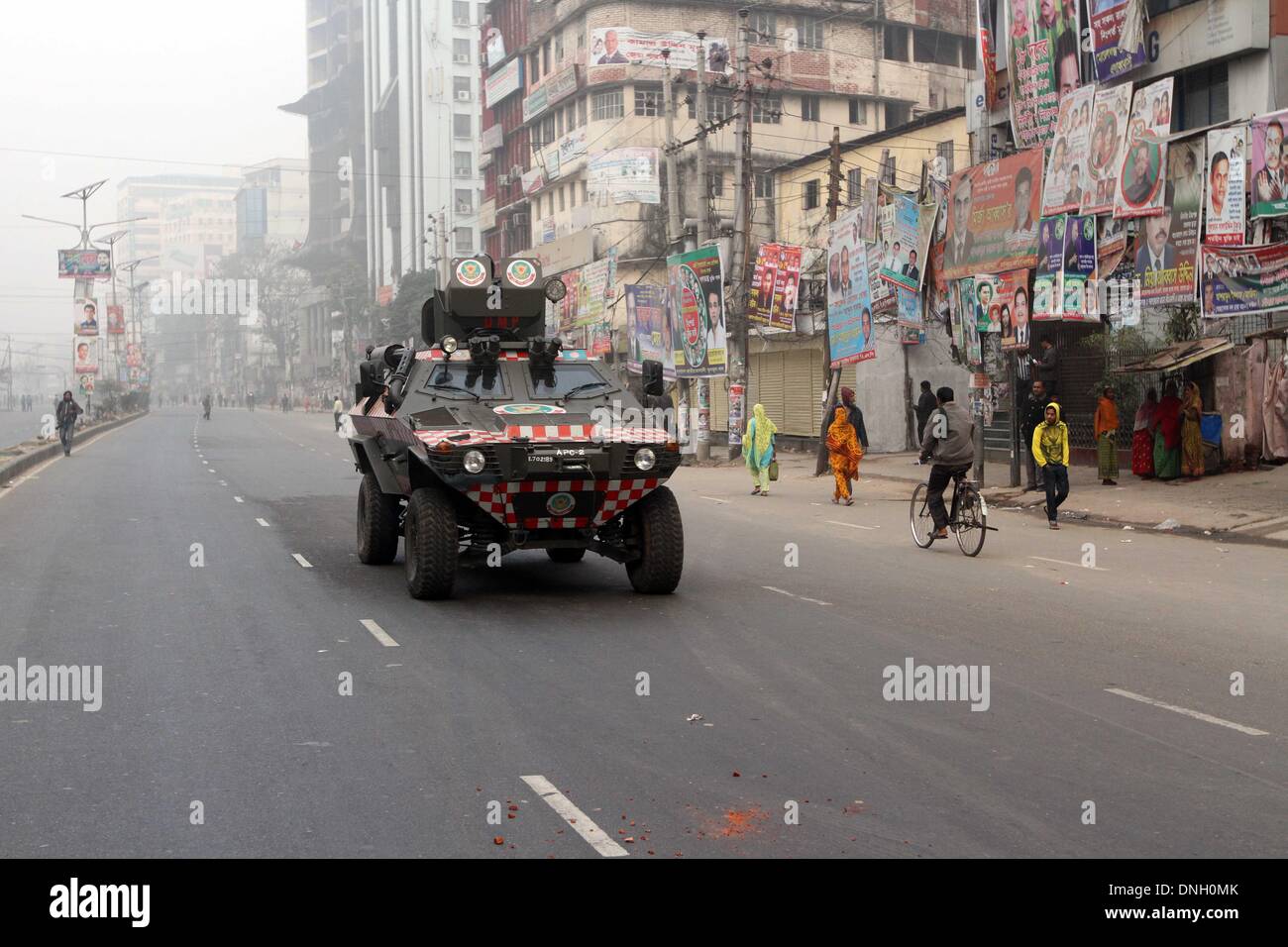 Dhaka, Bangladesh. 29th Dec, 2013. Bangladeshi police vehicle patrols ...