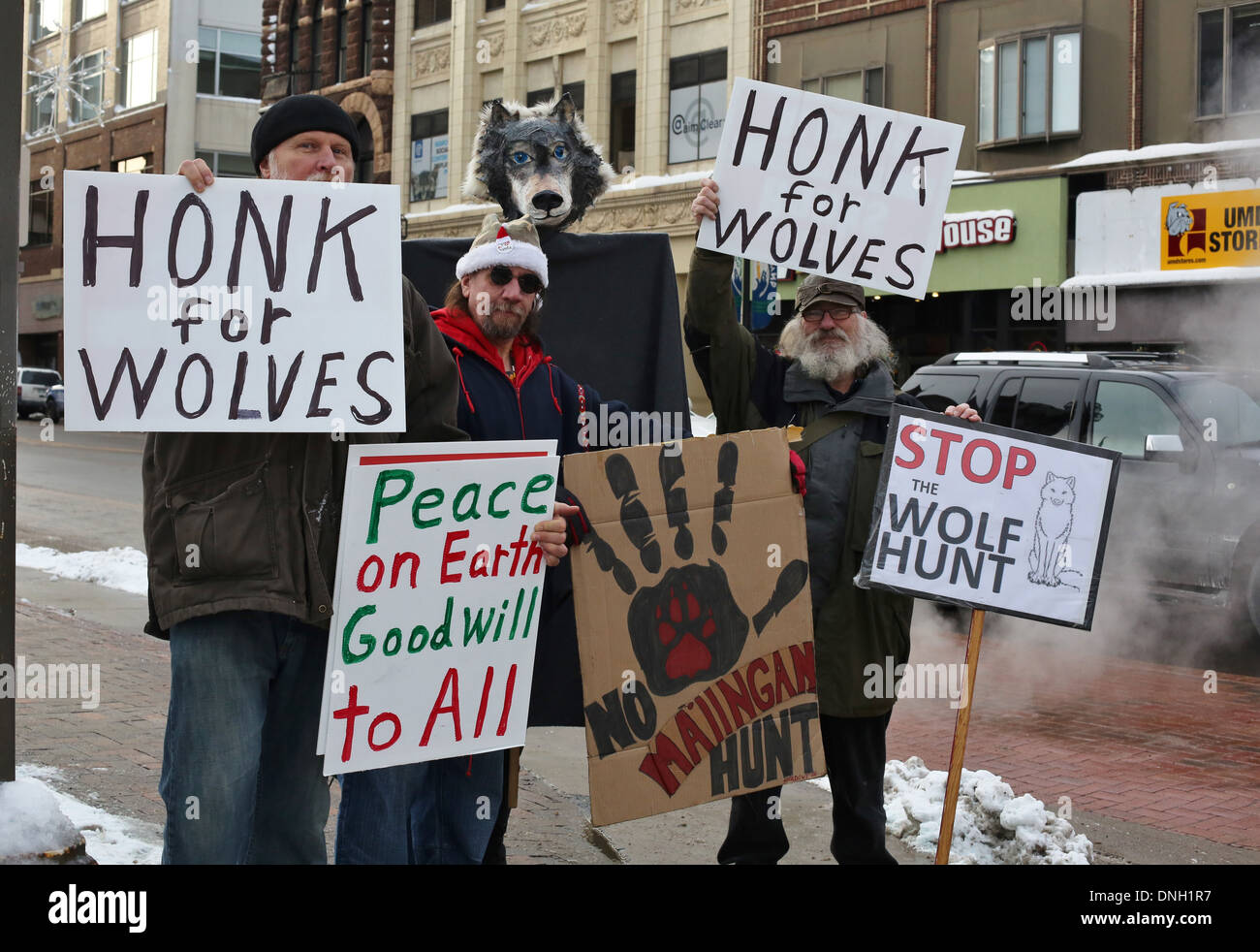 A group of people protesting against the wolf hunt, in Duluth ...