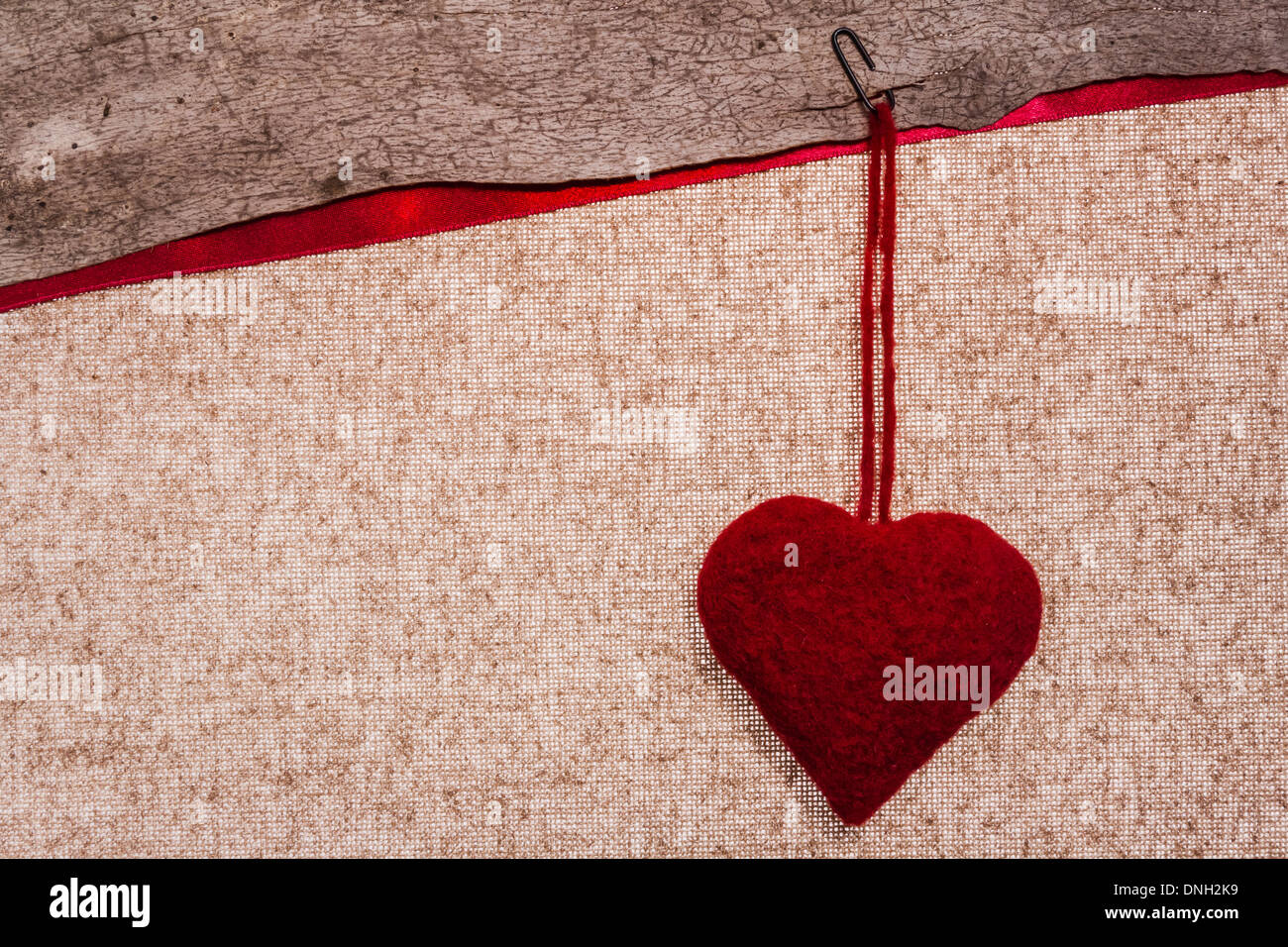 Valentine background with hand-sewn heart Stock Photo - Alamy