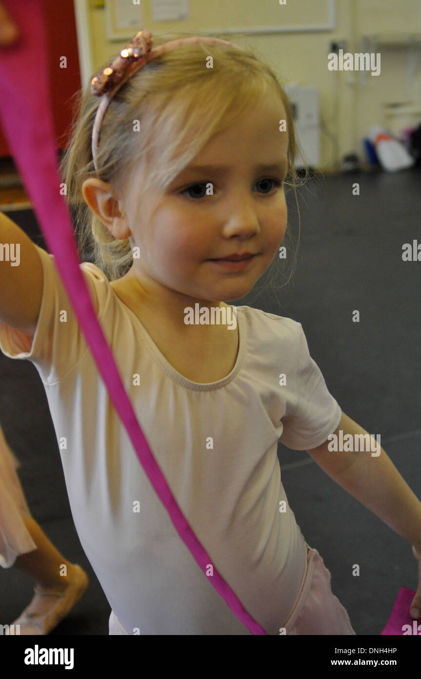 ballet-dancer does ballet with a pink ribbon Stock Photo - Alamy