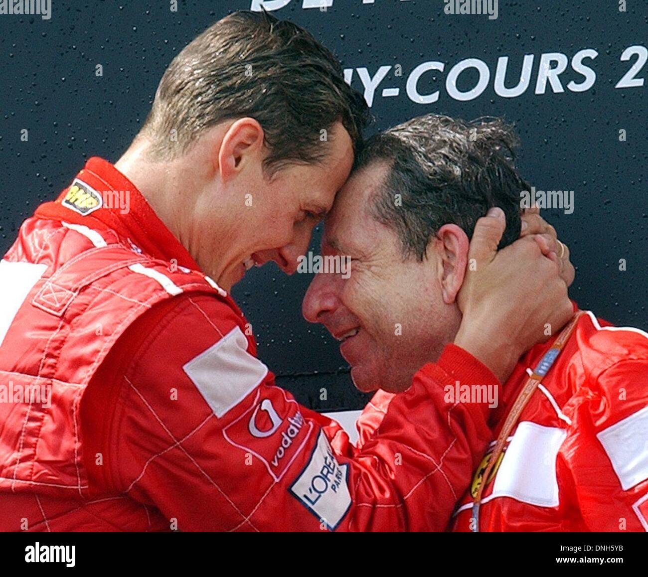 FILE: (dpa) - German formula 1 pilot Michael Schumacher (R) and Ferrari ...