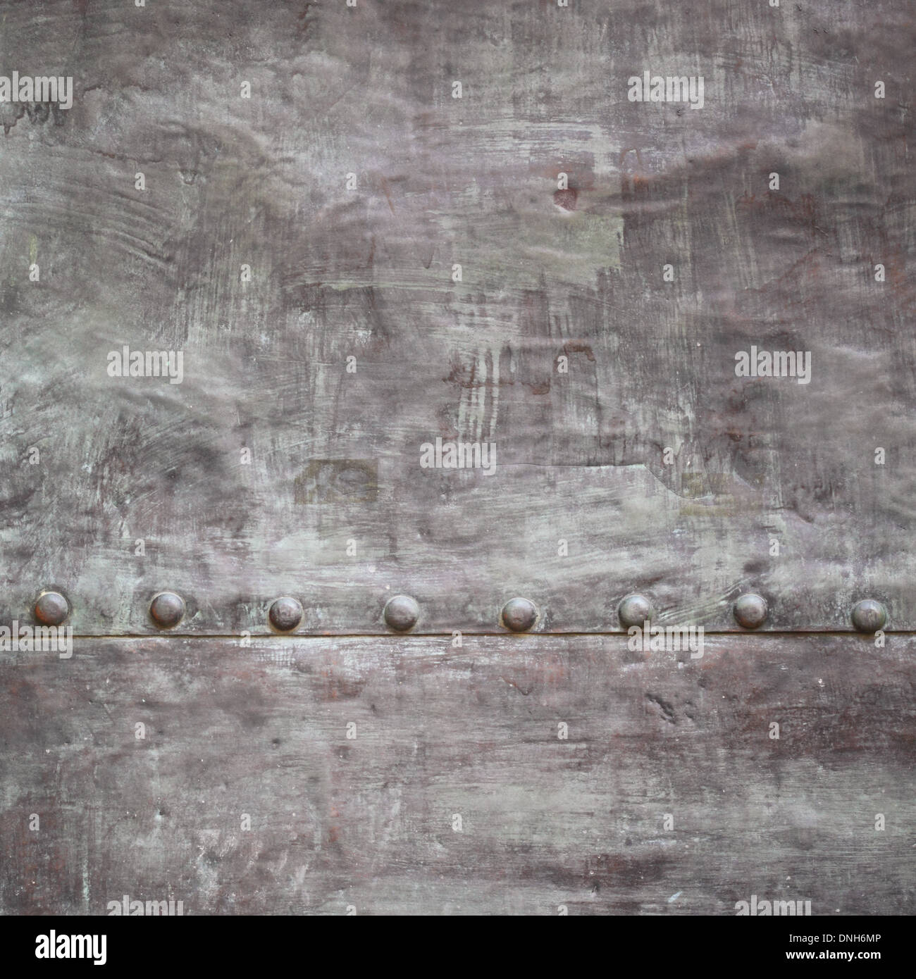 grunge metal plate or armour texture with rivets as background Stock ...