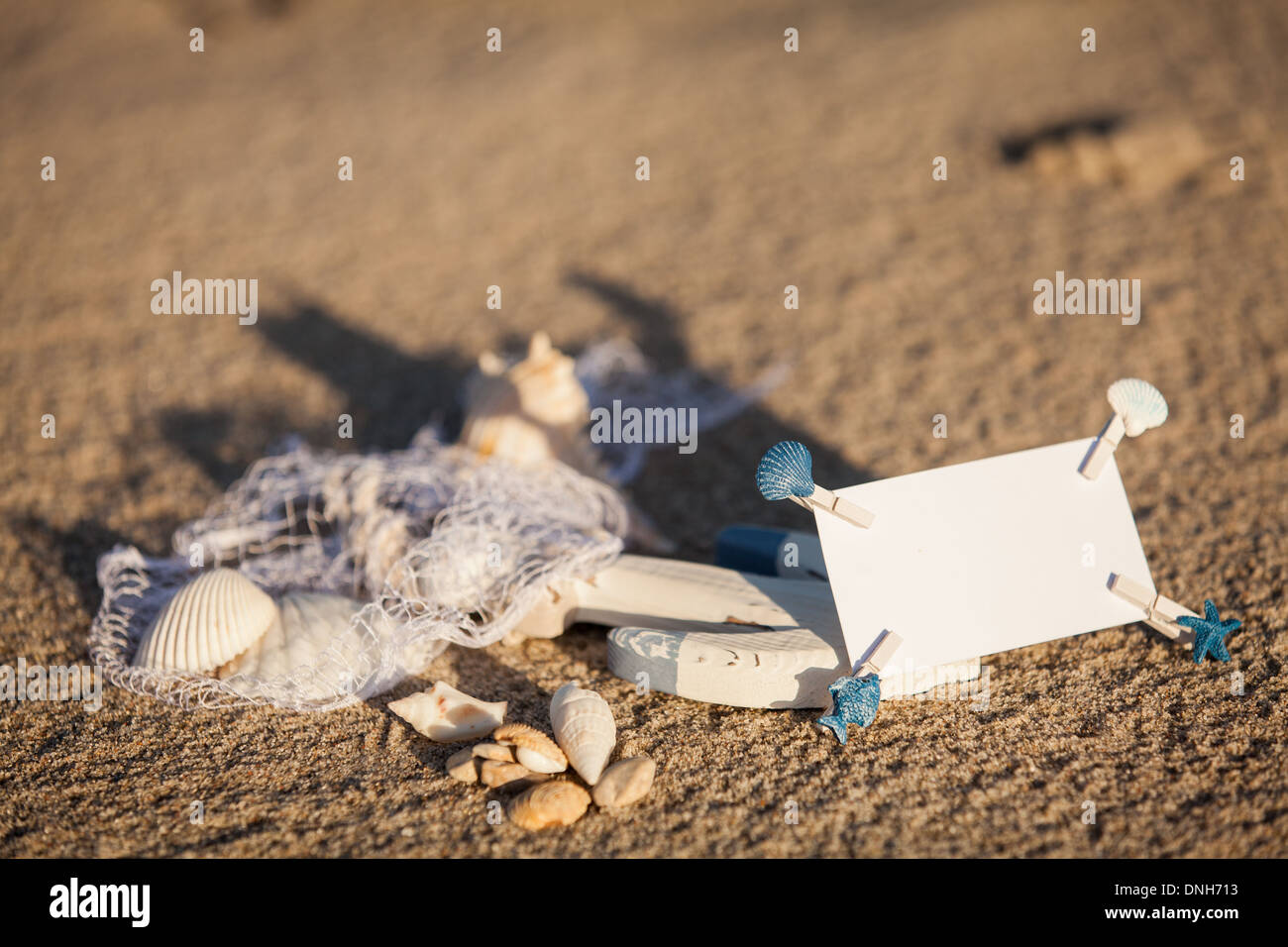 sailing boat and seashell in sand decoration closeup holiday background ...