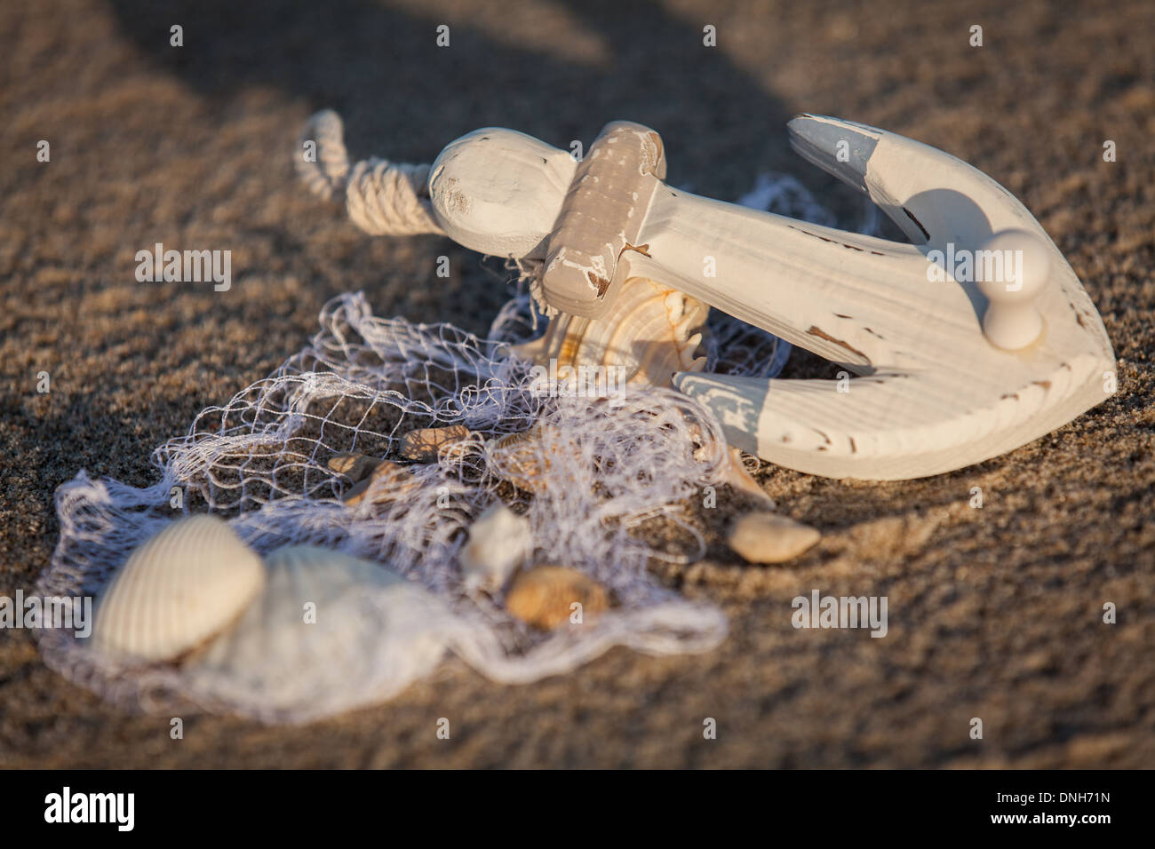 sailing boat and seashell in sand decoration closeup holiday background ...