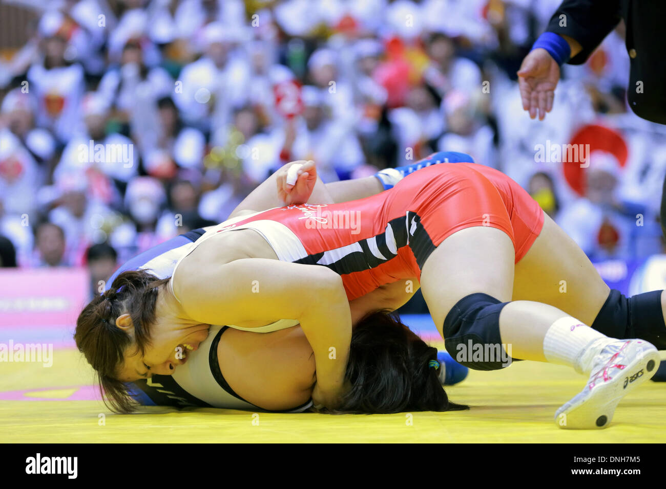 Tokyo, Japan. 23rd Dec, 2013. (T-B) Kyoko Hamaguchi, Rino Abe Wrestling ...