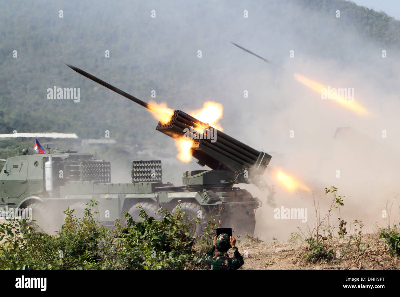 Kampong Speu, Cambodia. 30th Dec, 2013. BM-21 rocket launchers fire ...