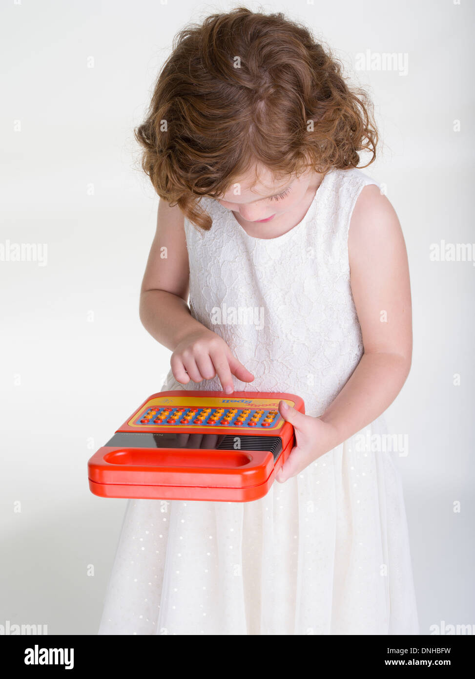 Young girl with 1978 Speak and Spell Toy by Texas Instruments Stock ...