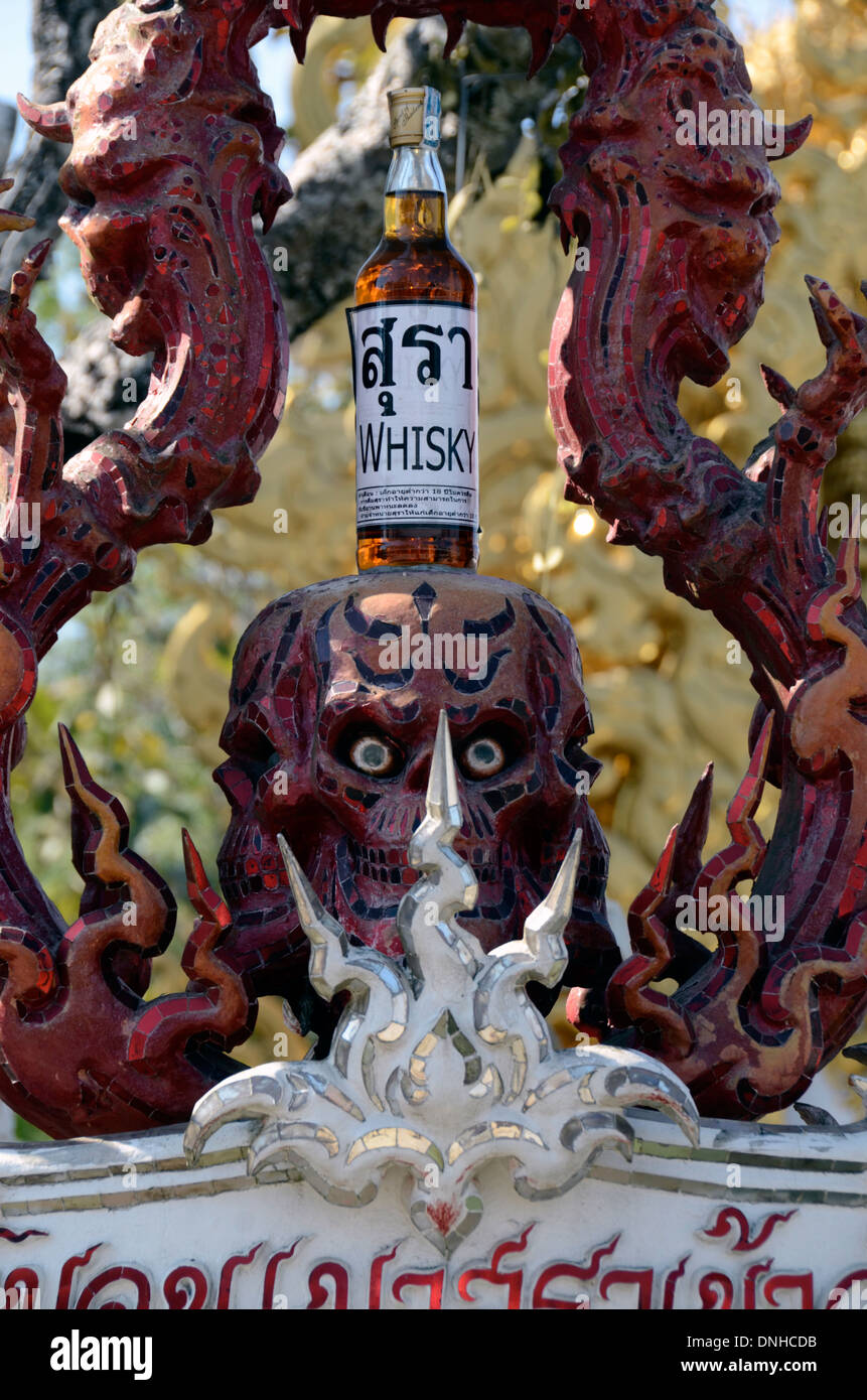 Skull with whisky bottle on top depicting evil of alcohol at the White ...