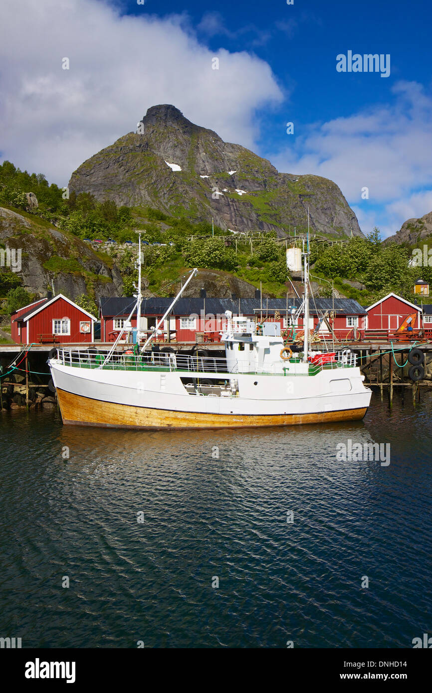 Fishing boat in Nusfjord harbour on Lofoten islands, Norway Stock Photo ...