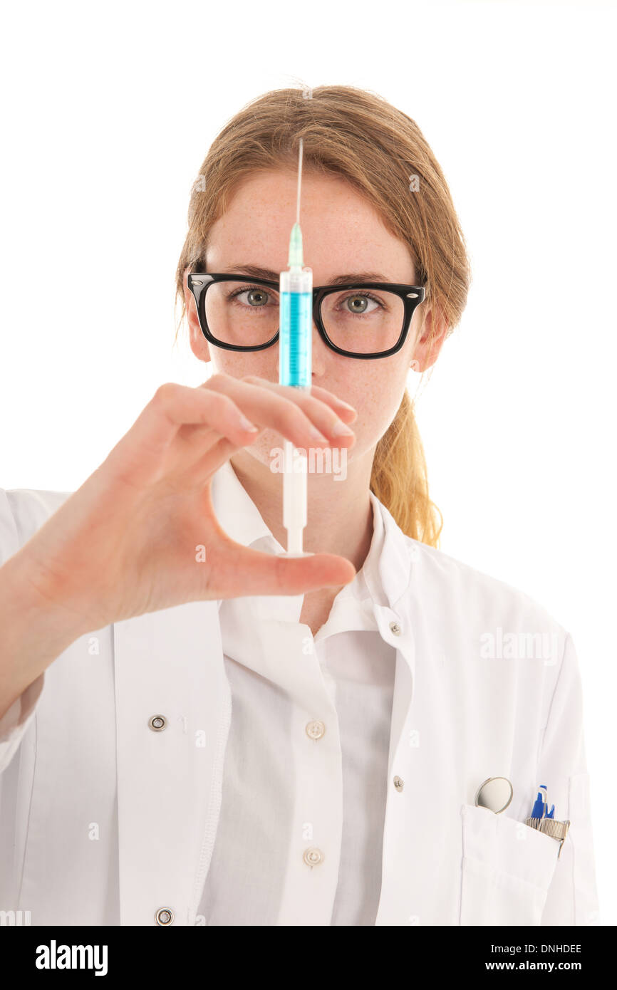 Female dentist with injection needle for anesthesia isolated over white ...