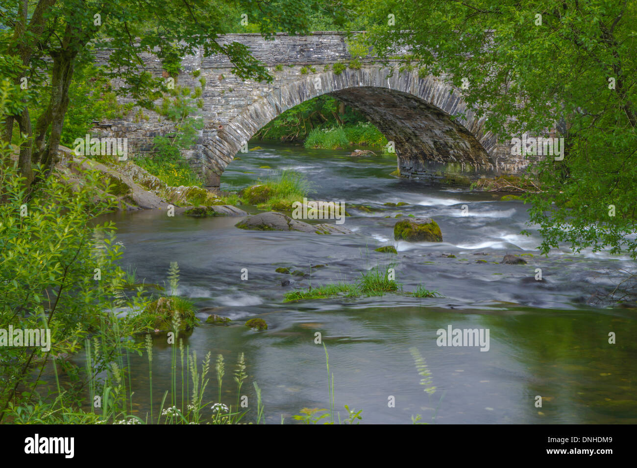 The River Brathay flowing under Skelwith Bridge Stock Photo - Alamy