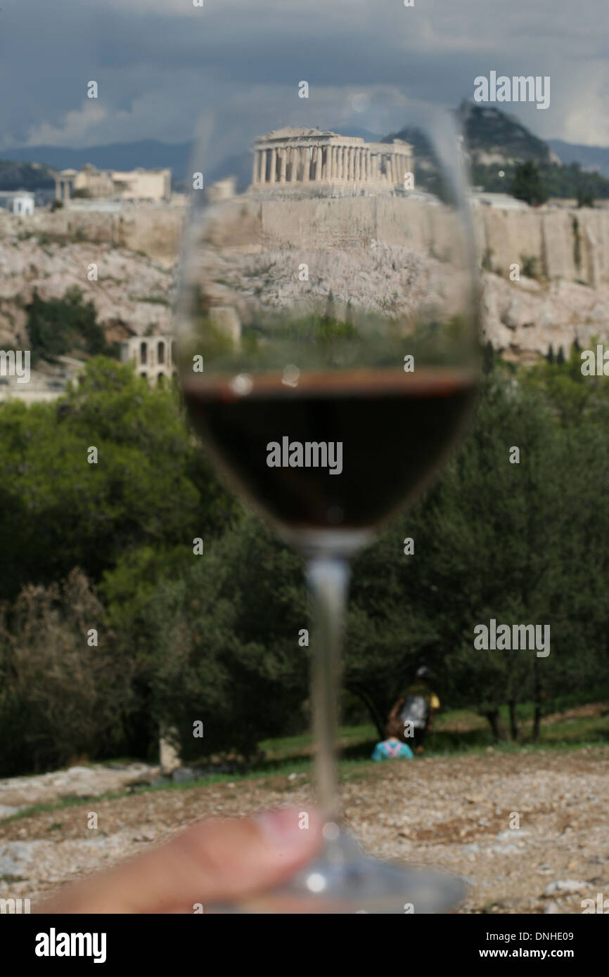 ATHENS, GLASS OF RED WINE IN FRONT OF THE ACROPOLIS, GREECE Stock Photo ...