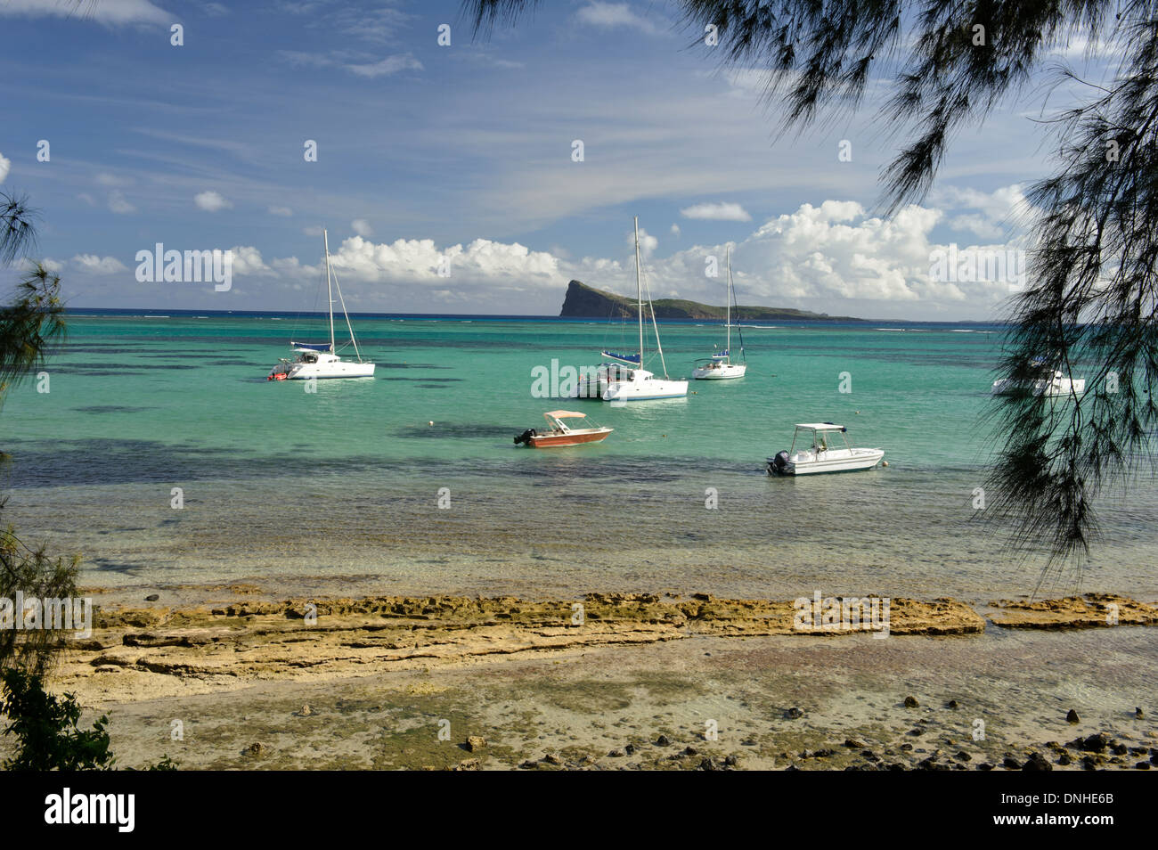 Scenic view of Coin de Mire island and fishing boats, Mauritius Stock ...