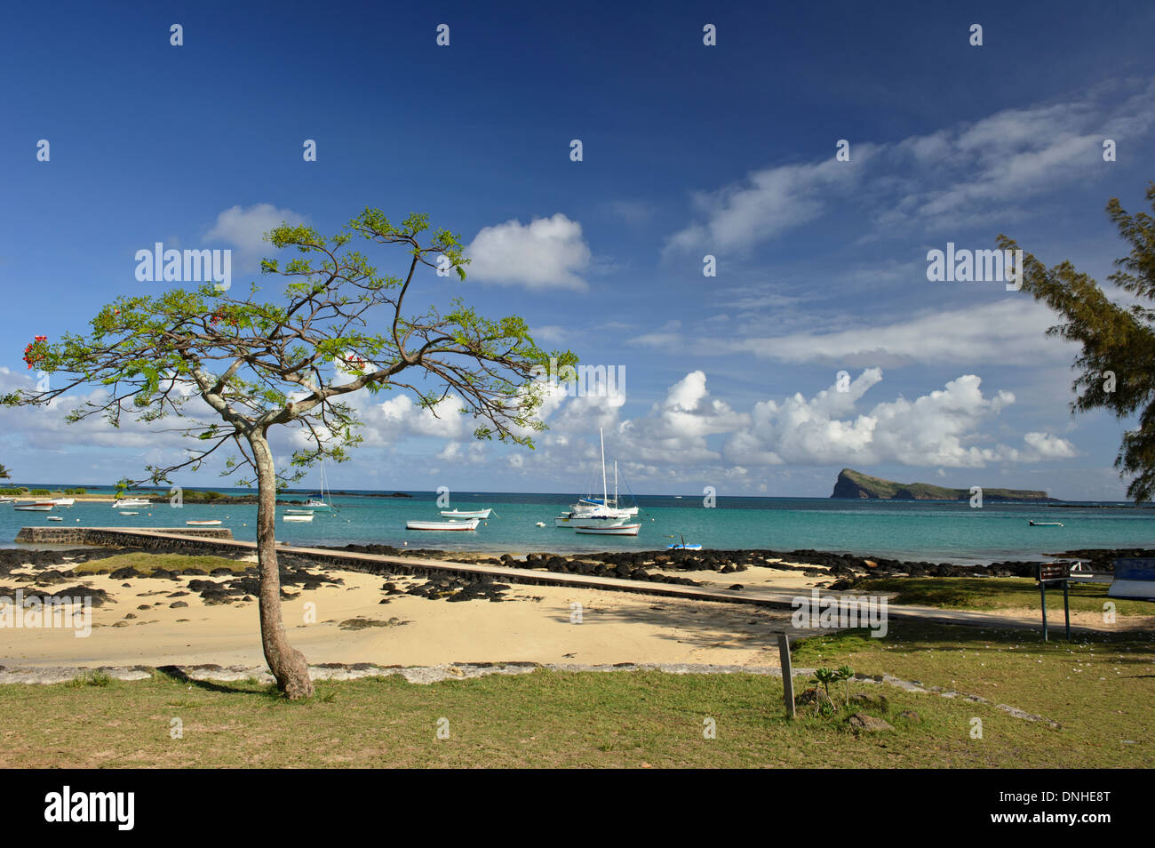 Scenic view of Coin de Mire island and fishing boats, Mauritius Stock ...