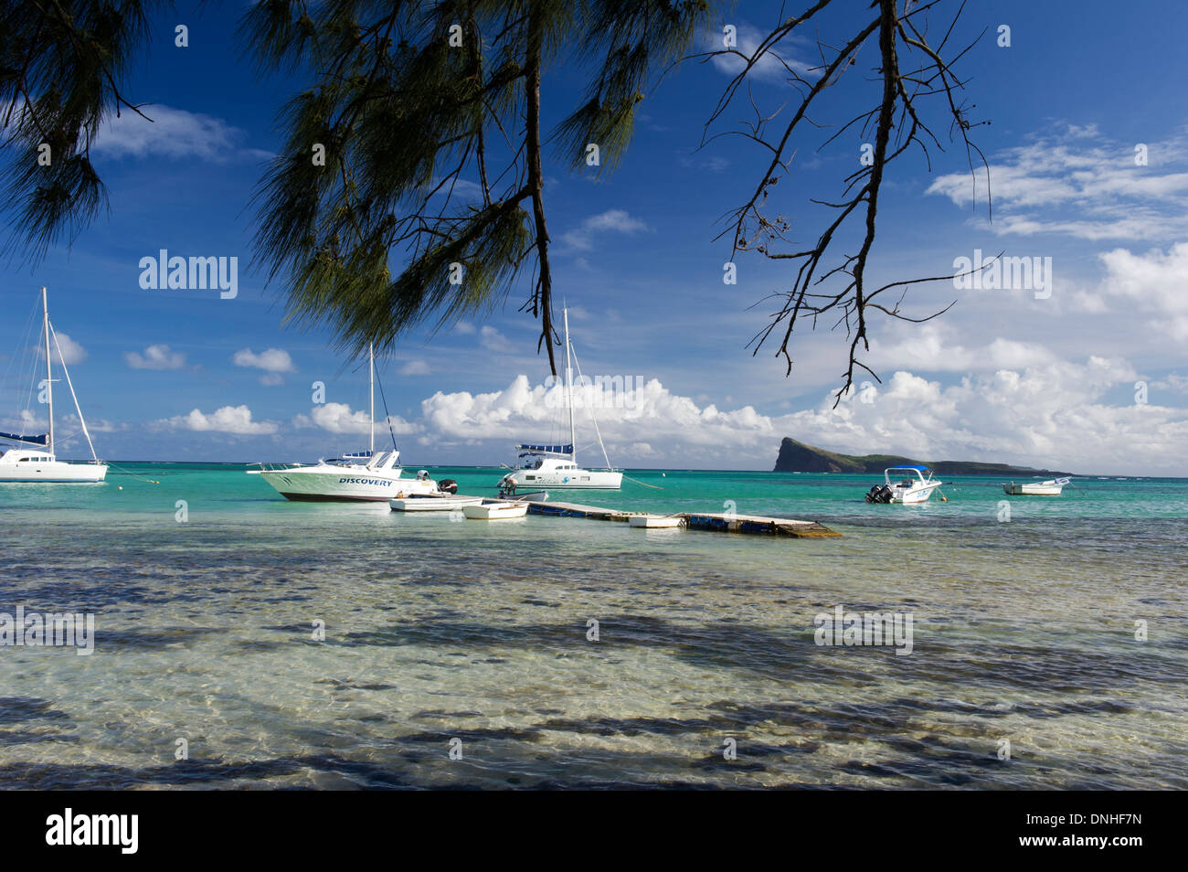 Scenic view of Coin de Mire island and fishing boats, Mauritius Stock ...