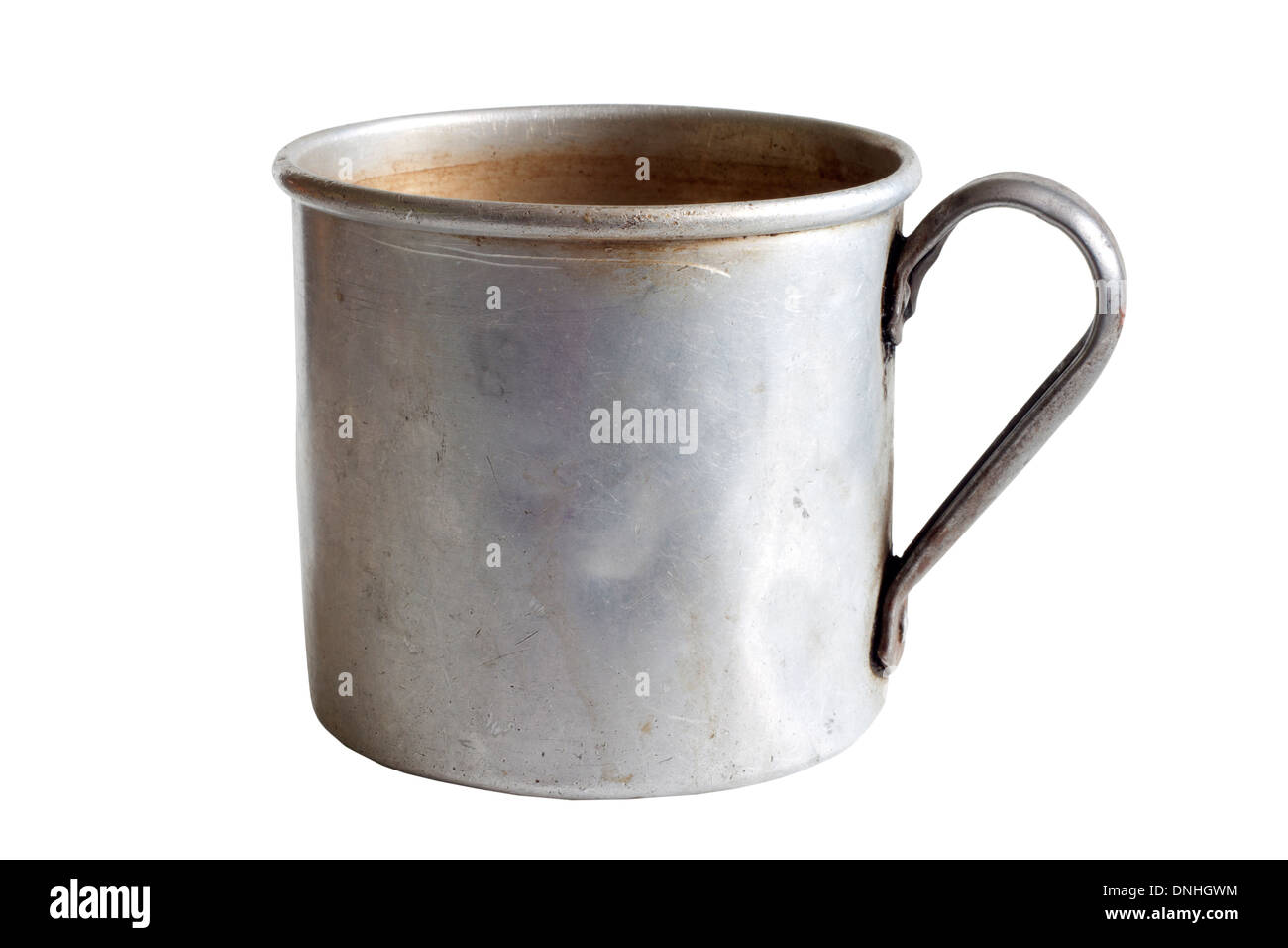 Old metal dirty retro cup isolated on white background Stock Photo - Alamy