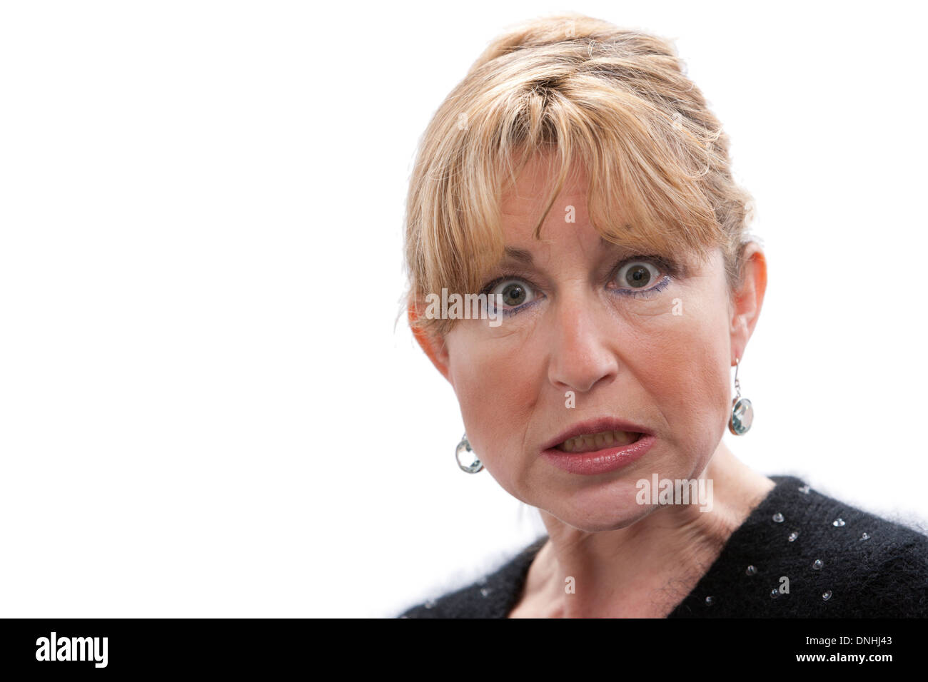 Angry senior woman on white background with room for text Stock Photo ...
