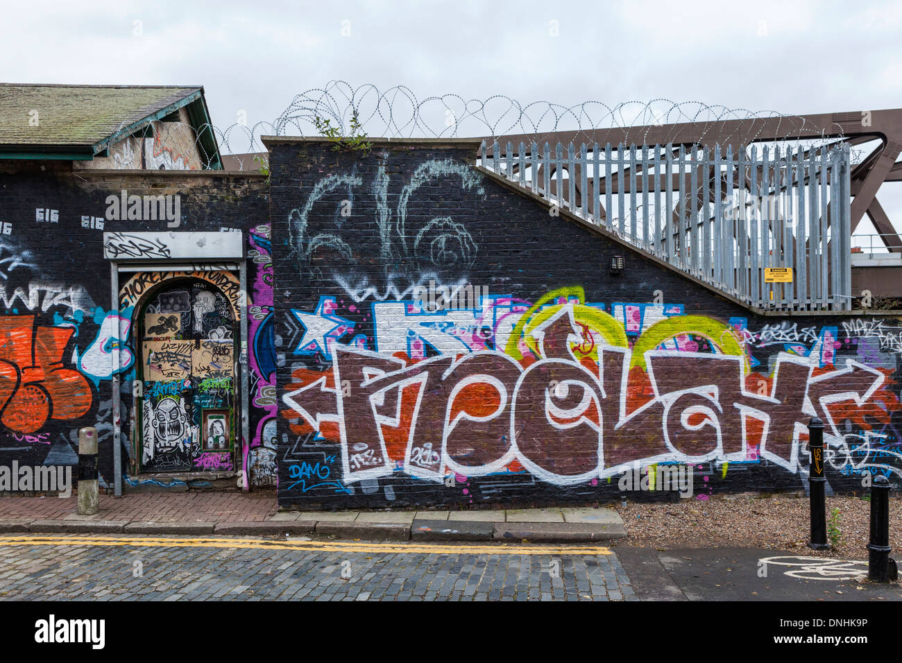 With graffiti barbed hi-res stock photography and images - Alamy