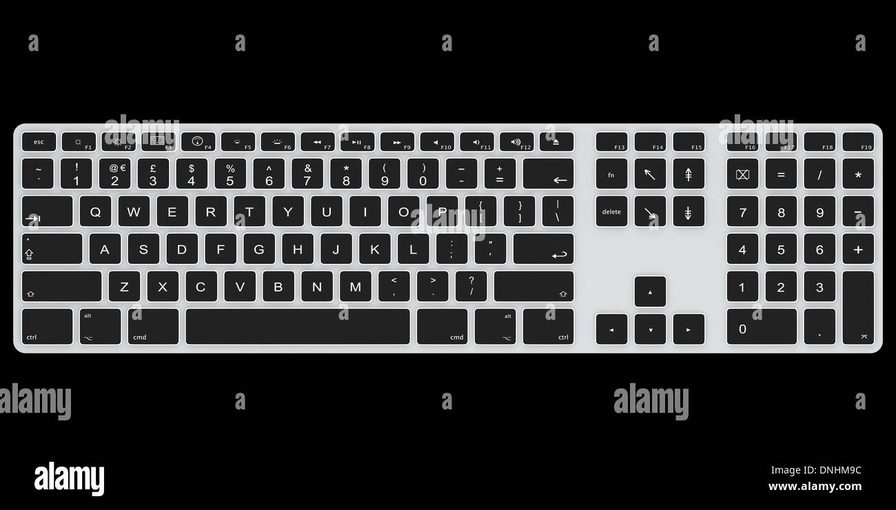 Computer keyboard isolated on dark background. Top view Stock Photo - Alamy