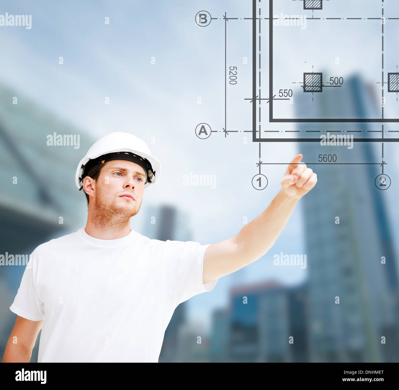 male architect pointing at blueprint Stock Photo - Alamy