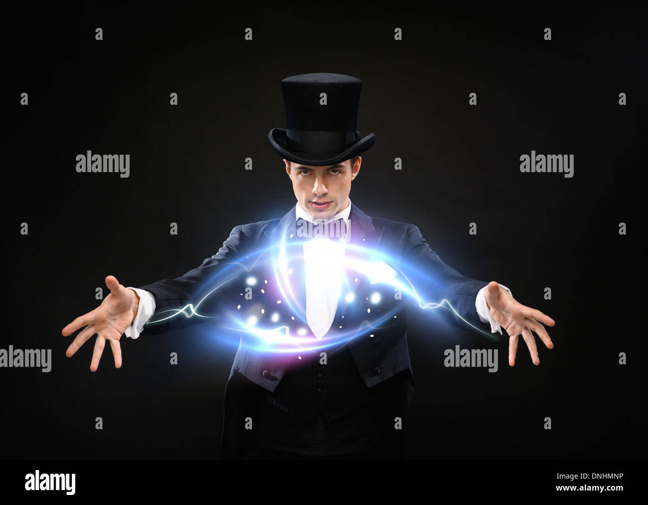 magician in top hat showing trick Stock Photo - Alamy