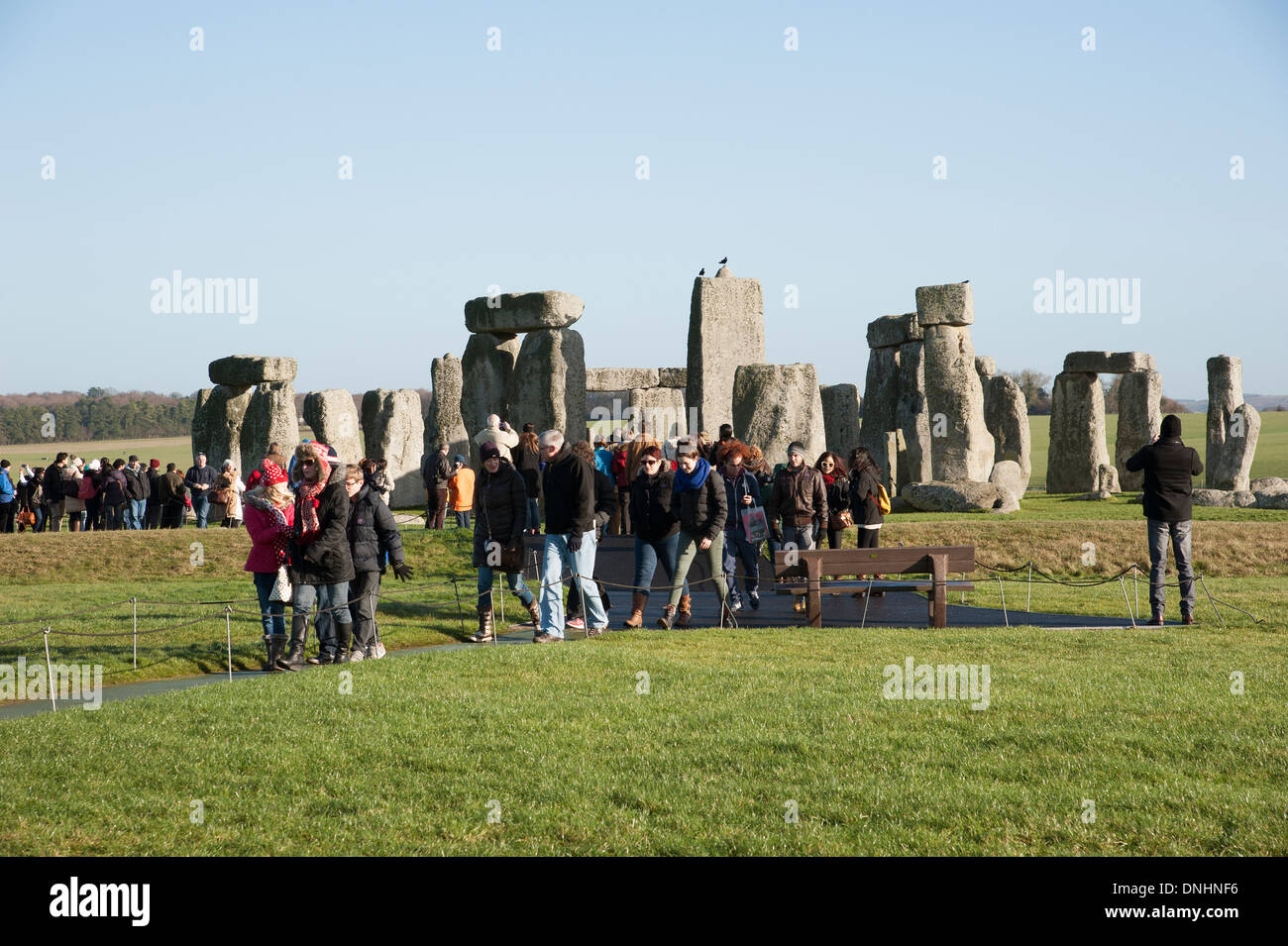 Stonehenge visitors at the historic stones in Wiltshire England UK ...